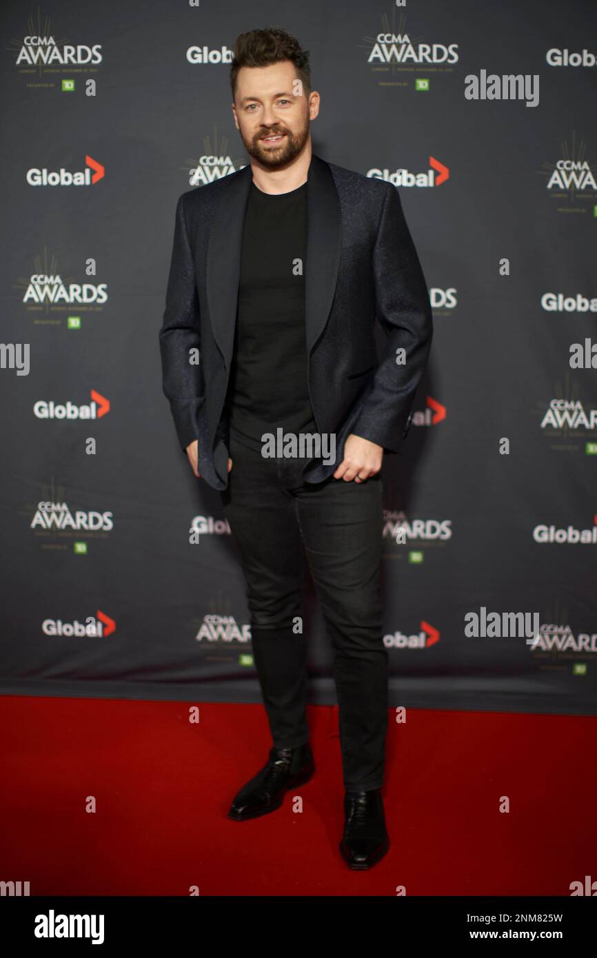 Shawn Austin poses for photographers on the red carpet at the Canadian ...