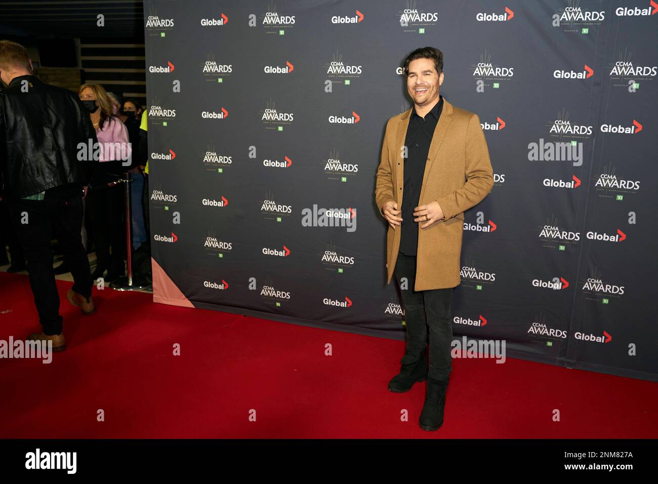 Steven Lee Olsen poses for photographers on the red carpet at the ...