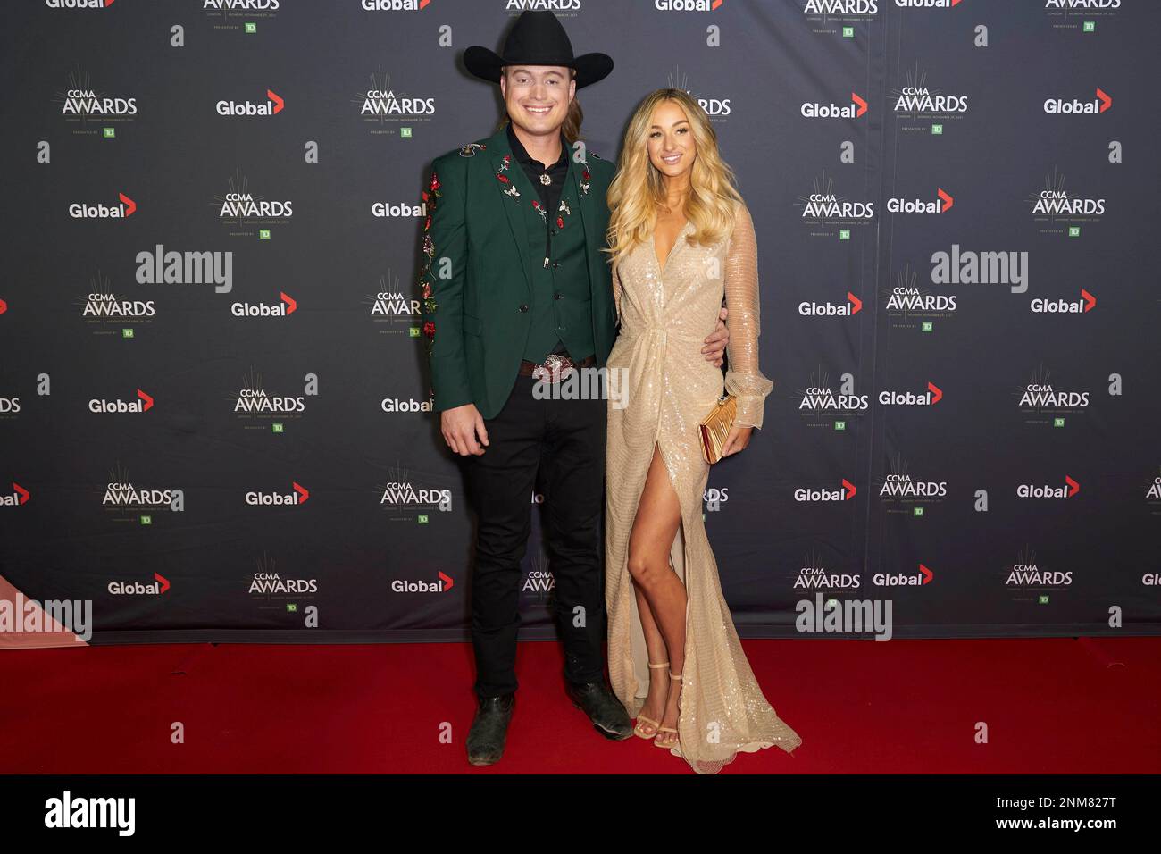 Jade Eagleson and his wife, Marina Paquin, pose for photographers on the red carpet at the ...