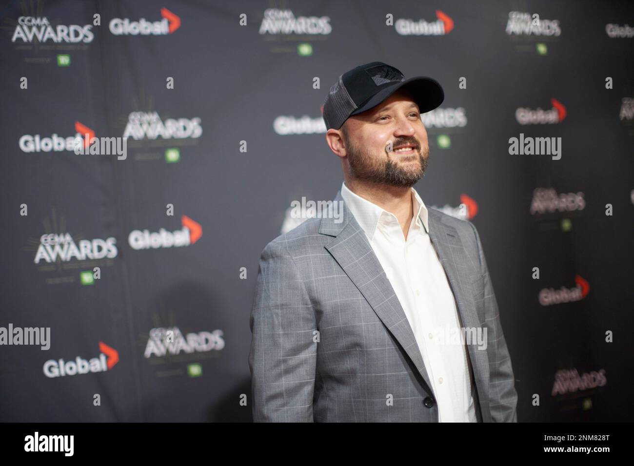 Aaron Goodvin poses for photographers on the red carpet at the Canadian ...