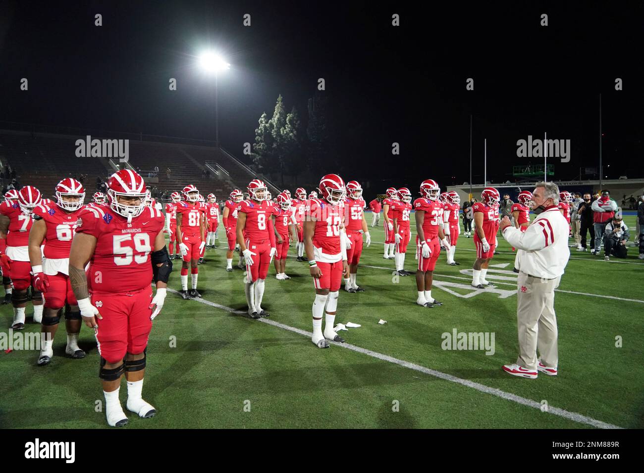 Mater Dei Monarchs coach Bruce Rollinson celebrates after a high school ...