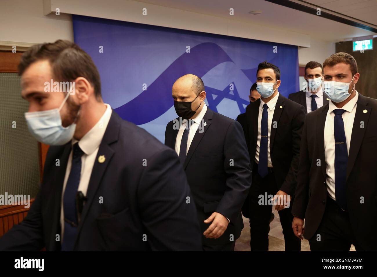 Israeli Prime Minister Naftali Bennett, second left, arrives for a ...
