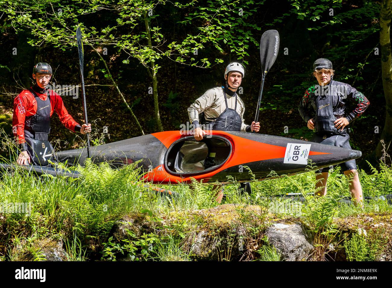 three young men practicin kayaking at the Tryweryn river, National ...