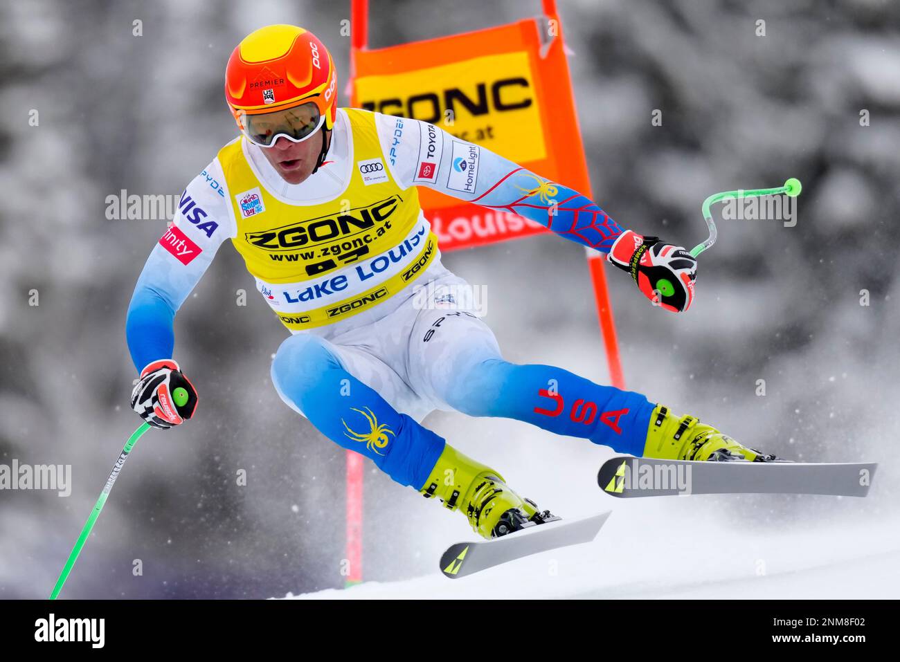 Steven Nyman, of United States, flies down the course during the men's ...