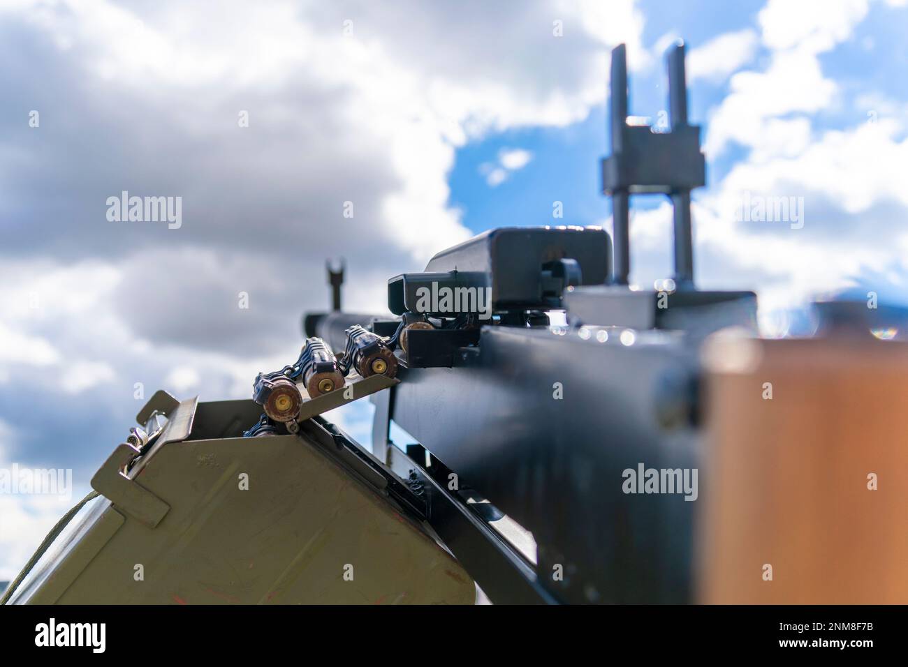 Anti-aircraft machine gun aims at the sky Stock Photo - Alamy