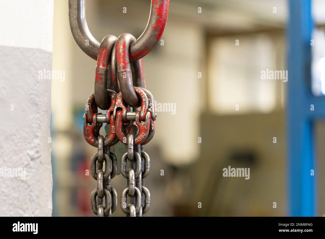 Industrial chains with shabby red paint Stock Photo - Alamy