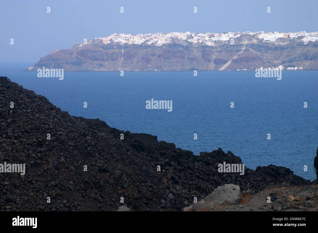 View of Oia town Santorini main island taken from the volcano in the ...