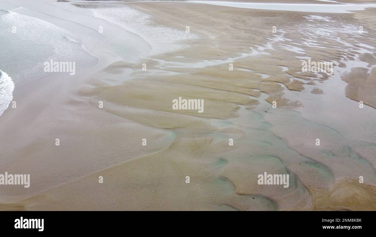 Sandy seashore, top view. Minimalistic seascape, a copy space. Wet sand ...