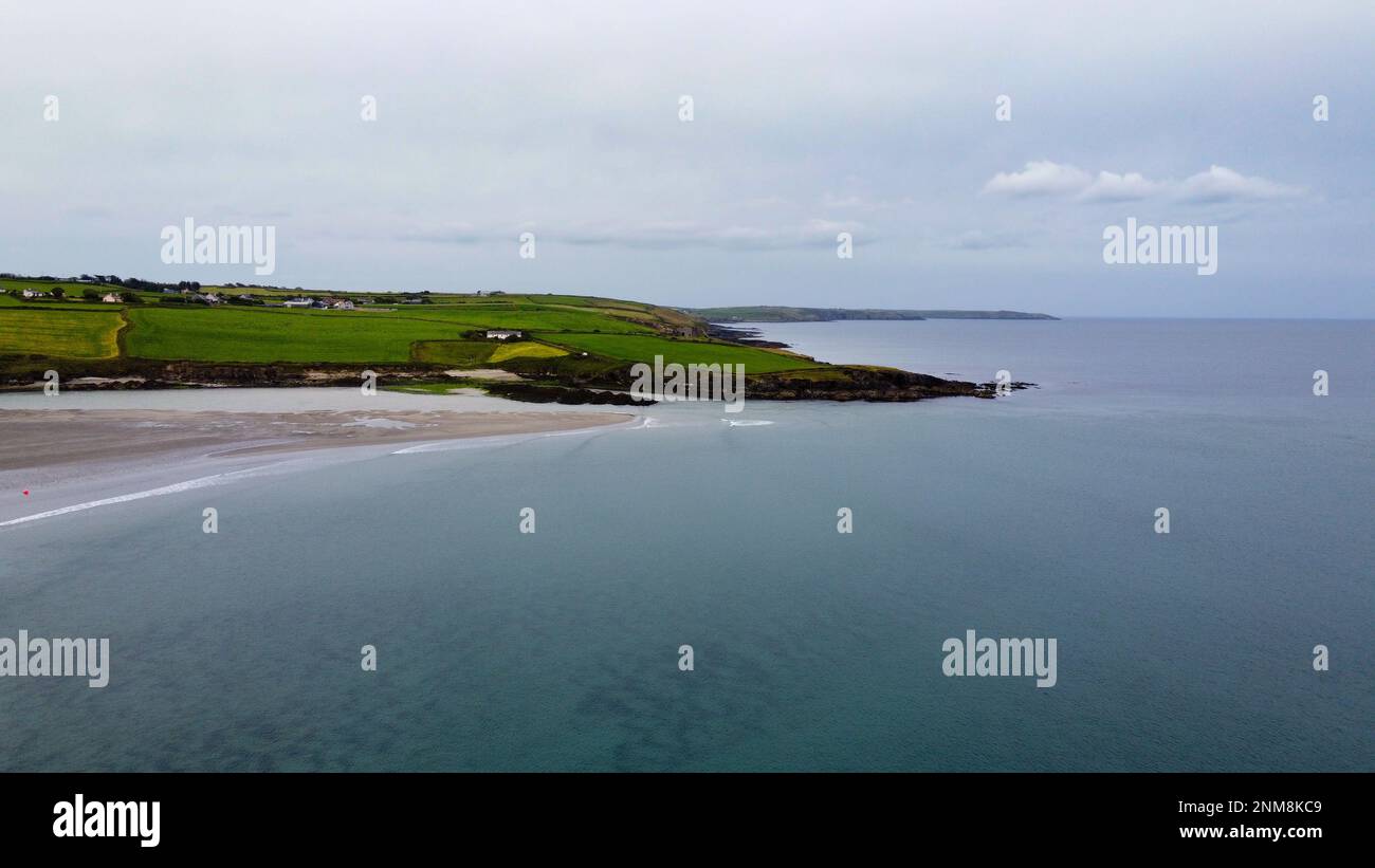 Irish seascape. The coast of the Atlantic Ocean. Green field on island ...