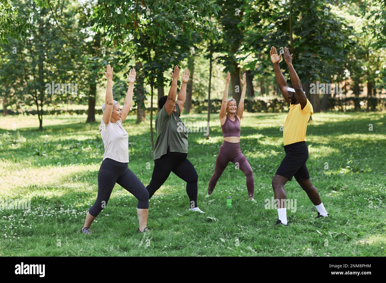 Full length portrait of senior women enjoying sports workout outdoors ...