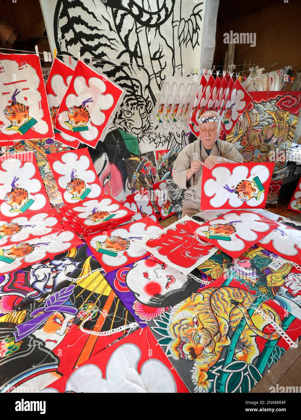 Mikio Toki, Japanese traditional kite master, is busy making Edo Kaku ...