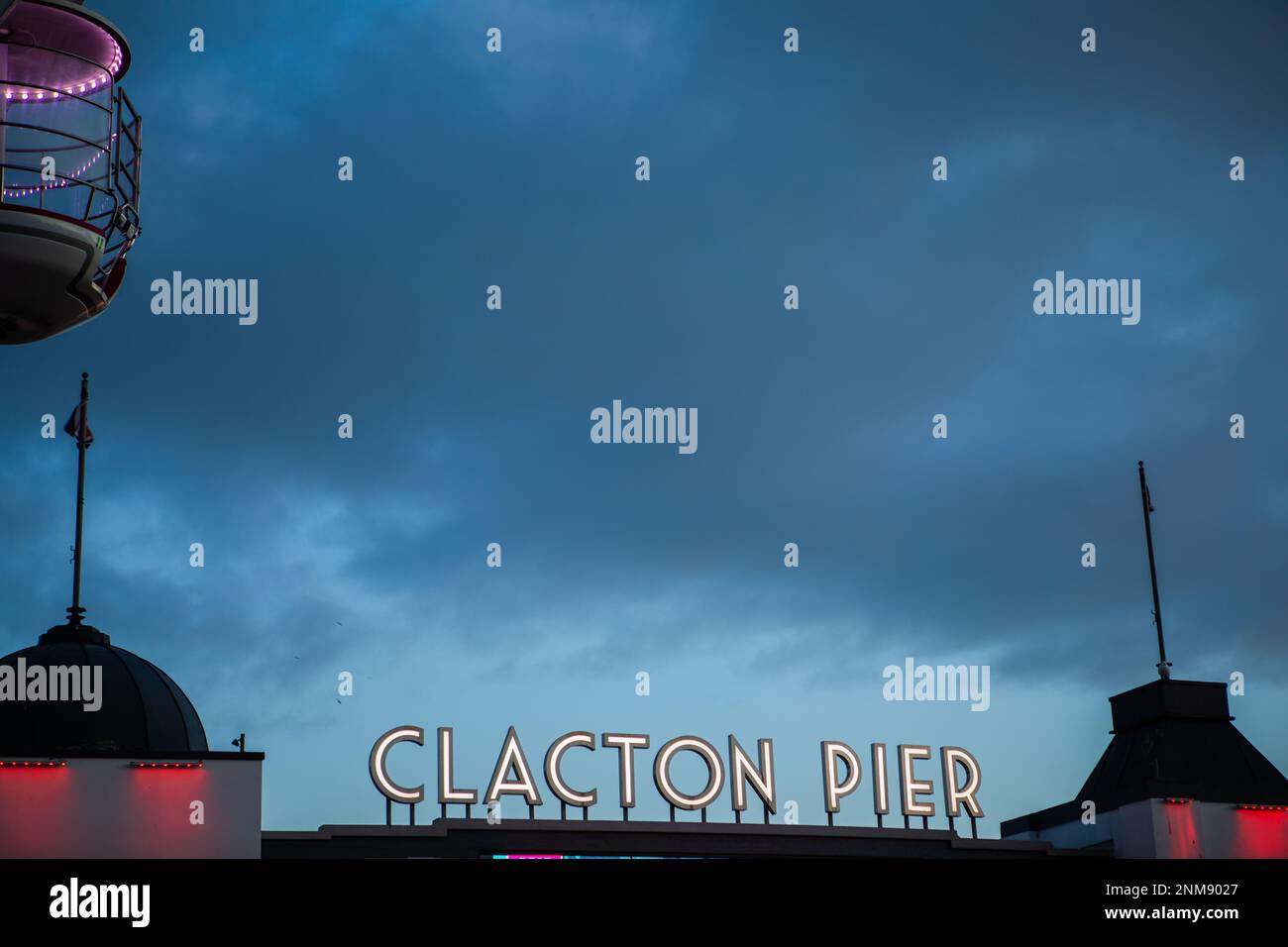 Clacton Pier at Night / Dusk showing a Ferris wheel Stock Photo - Alamy