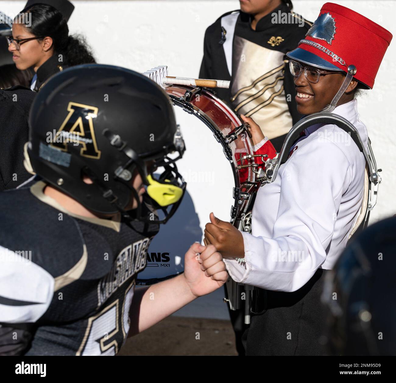 Sweetwater High School band member Ange Mekogue, 15, fist bumps Andrews ...