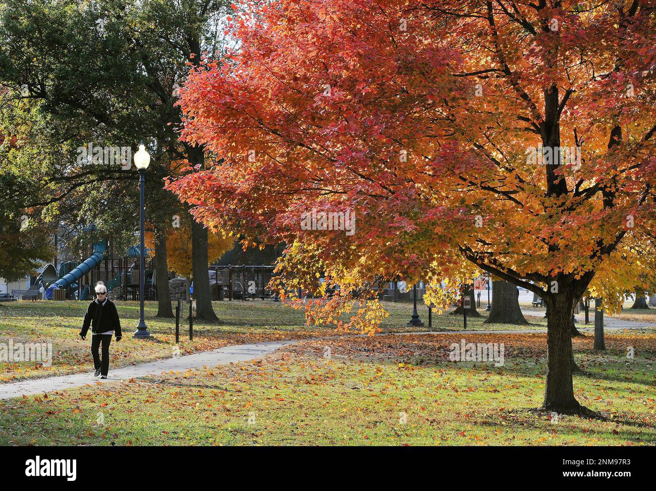 Roberta Kish goes for a brisk walk along the paved walking trail at ...