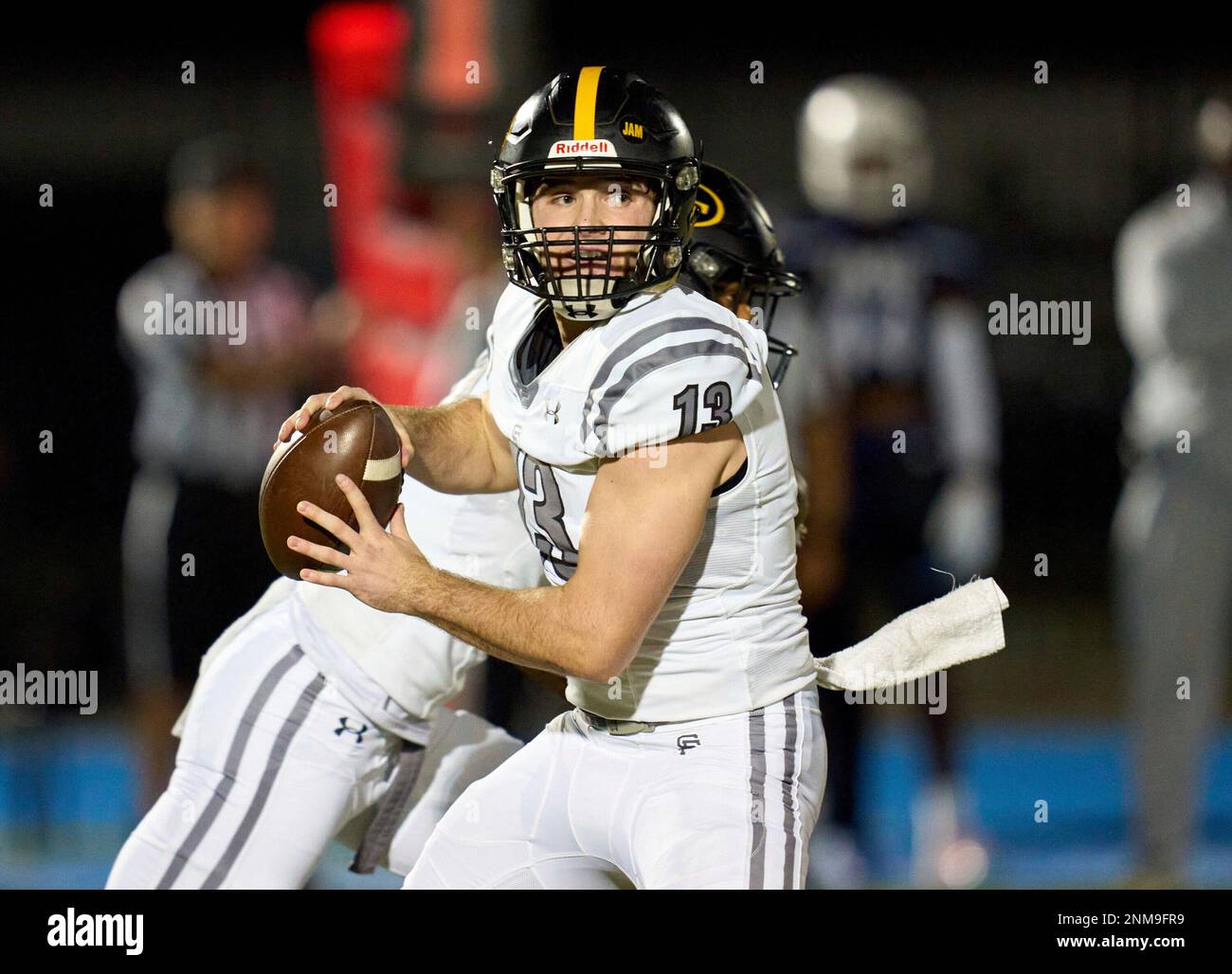 St. Frances Academy Panthers quarterback John Griffith (13) looks to ...
