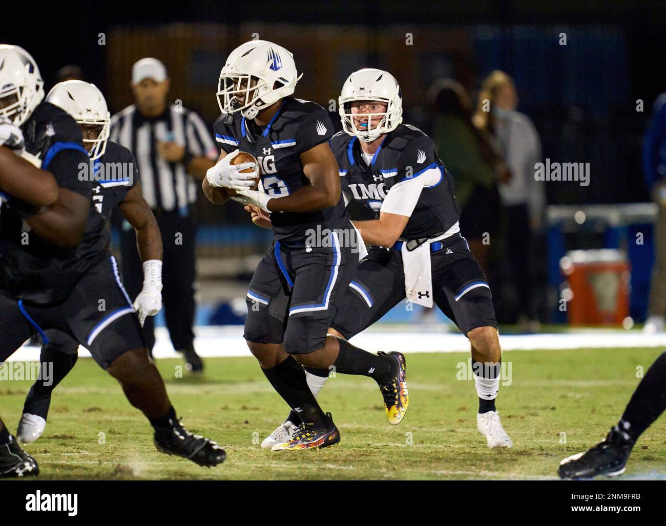 IMG Academy Ascenders running back Kaytron Allen (13) takes the handoff ...