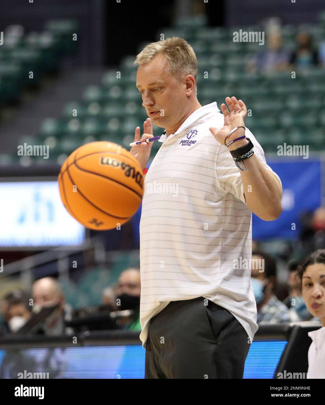 November 19, 2021 - Portland Pilots head coach Michael Meek avoids a ...