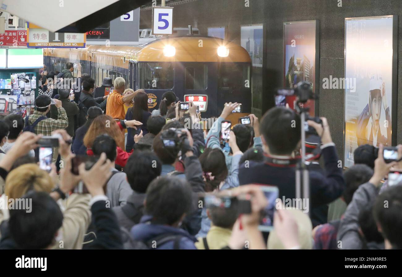 The Kintetsu 12200-series model, a limited express train, is crowded ...