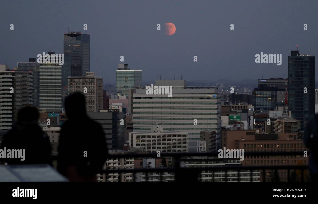A photo shows a partial lunar eclipse seen from Sendai, Miyagi ...