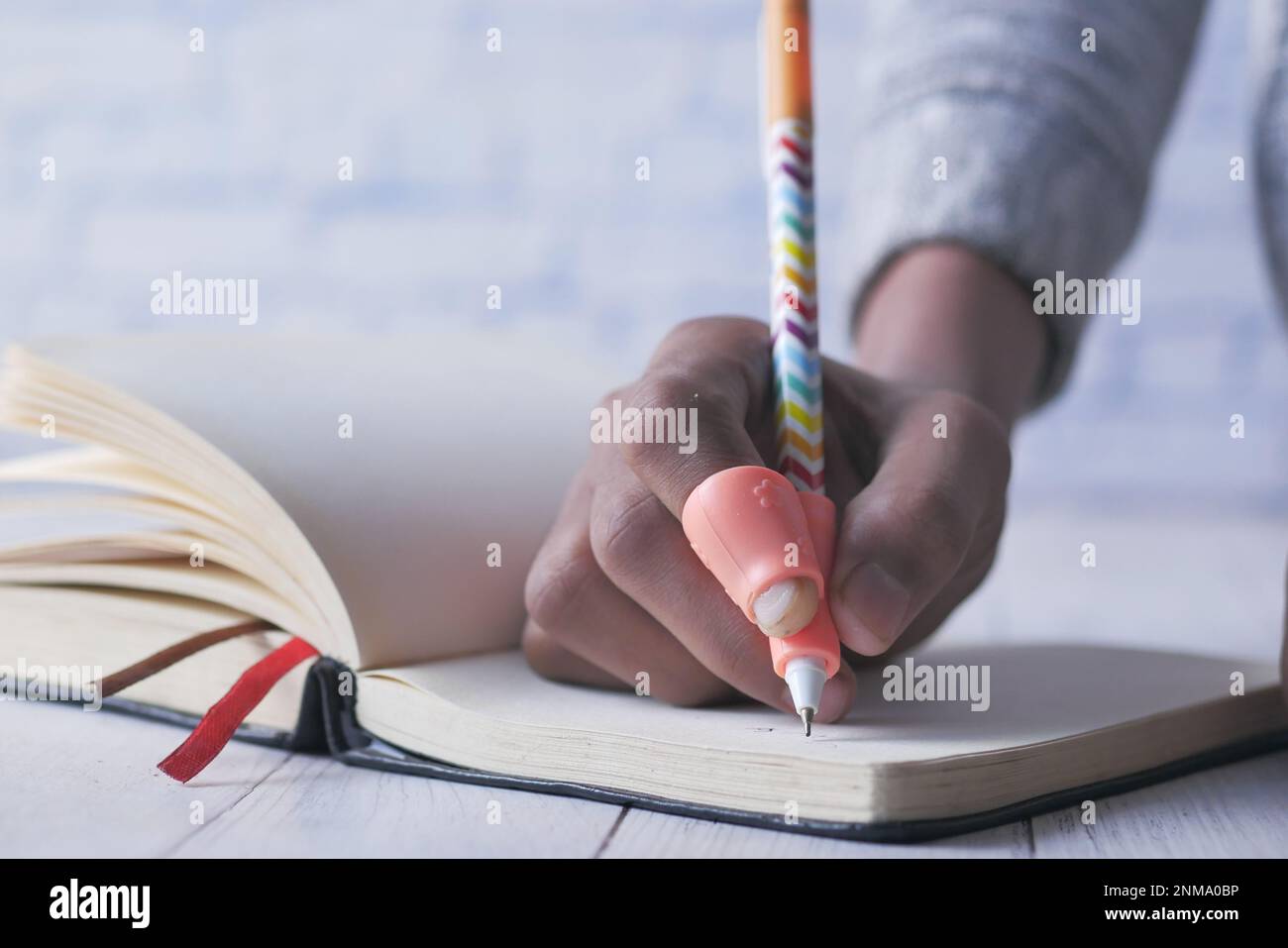 childing using writing corrector pen holder postures grip Stock Photo ...