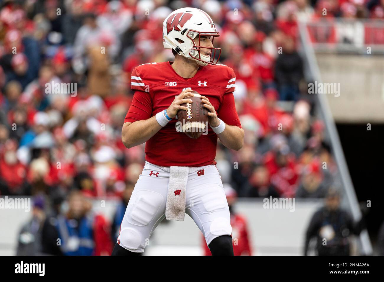 Wisconsin Badgers quarterback Graham Mertz (5) looks for a receiver ...