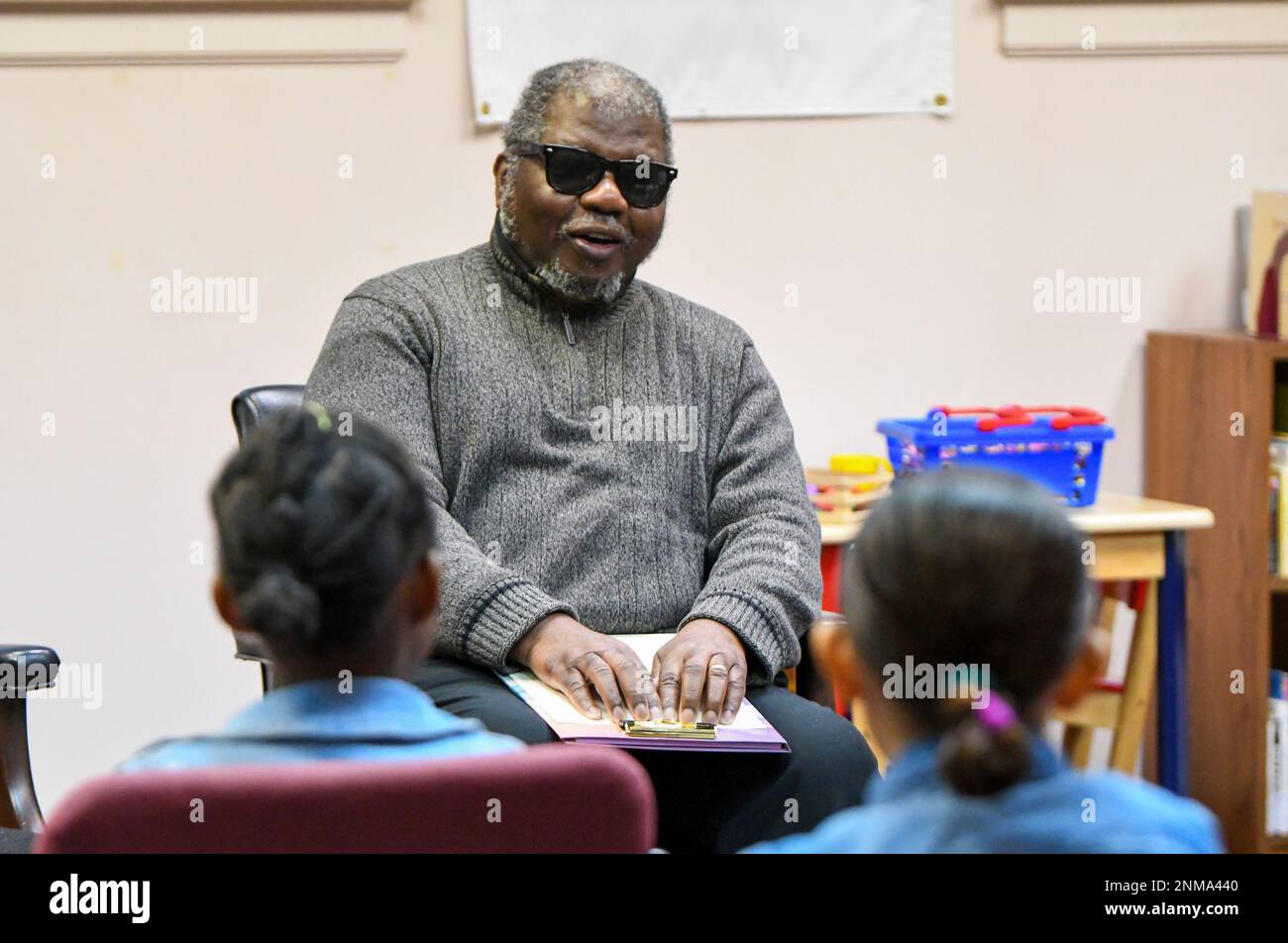 The Rev. Darnell Golphin, of Schuylkill Haven, Pa., reads a poem in ...