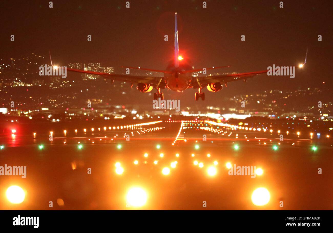 A photo shows a airplane taking off from Itami Airport at Itami Sky ...