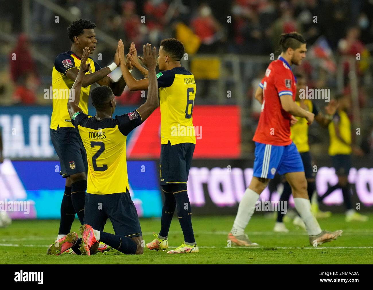 Players of Ecuador celebrate winning 2-0 against Chile at the end of a ...