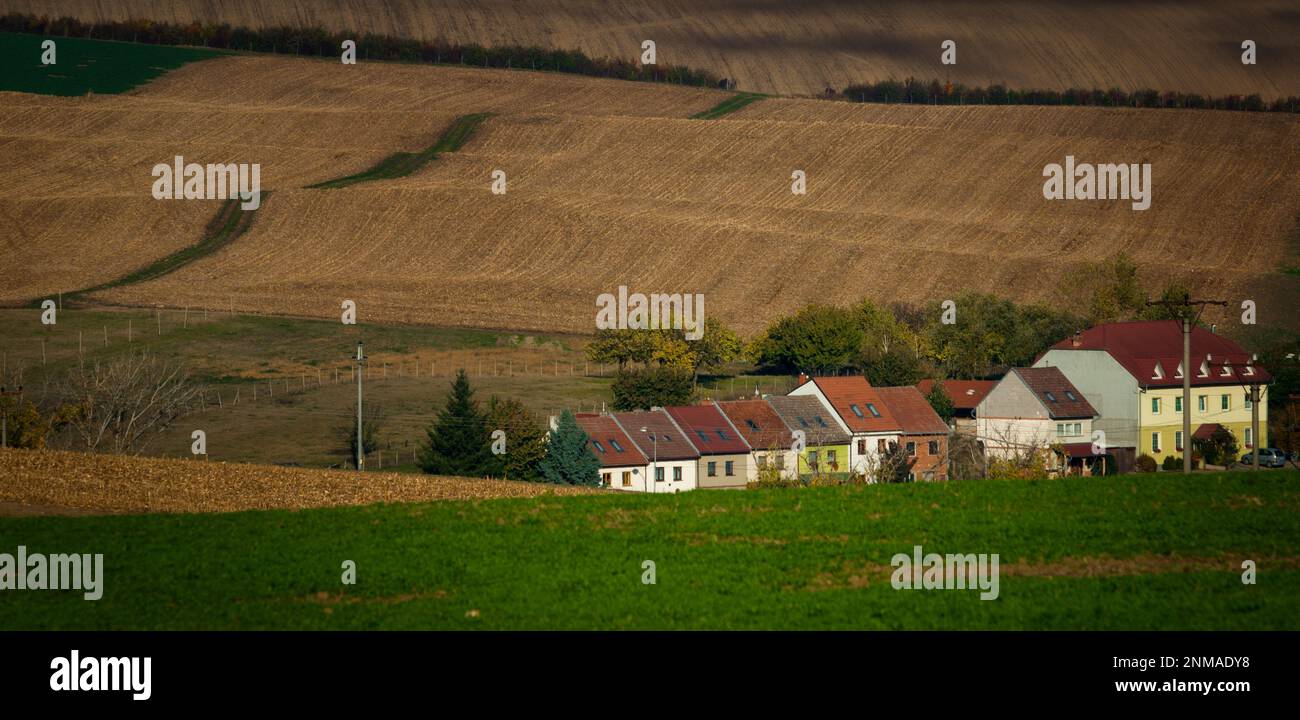 Terraced village buildings against the backdrop of rolling Moravian ...