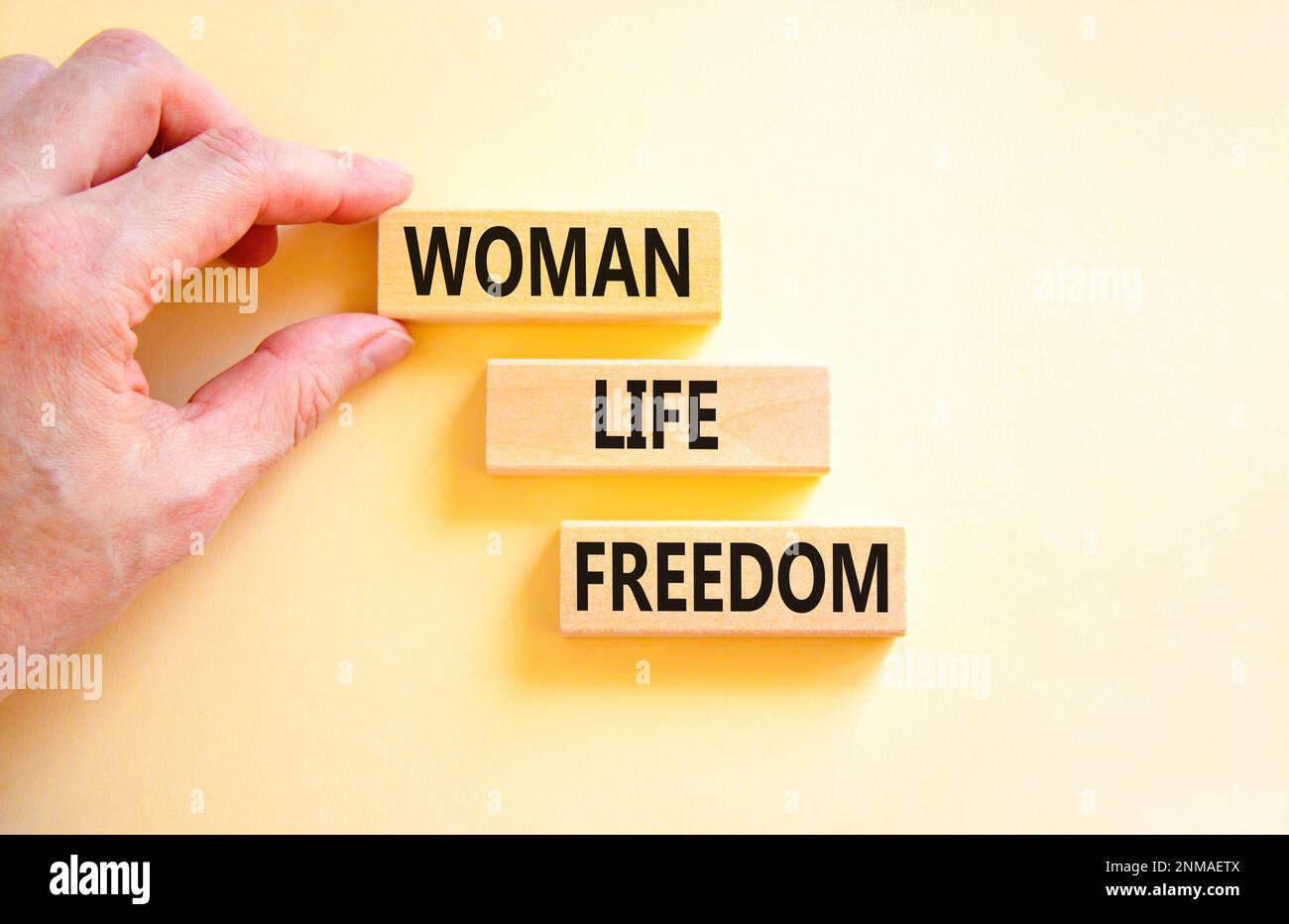Woman life freedom symbol. Concept words Woman Life Freedom on wooden ...