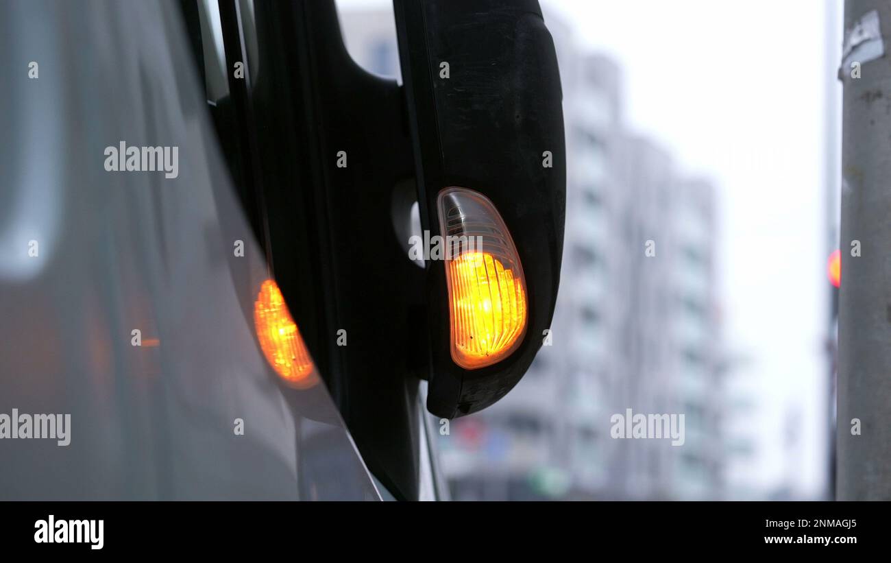 Truck blinking light stop sign in city. Car vehicle light flashing in ...