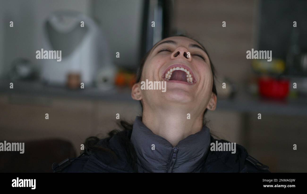 Woman lughing out loud. Person spontaneous real life laugh and smile ...