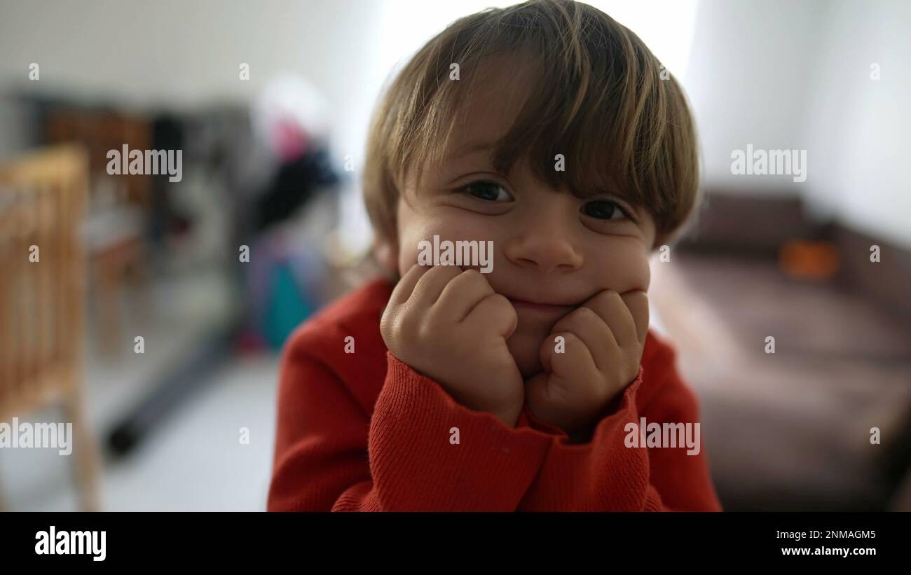 One cute little boy portrait face closeup smiling at camera. Adorable ...