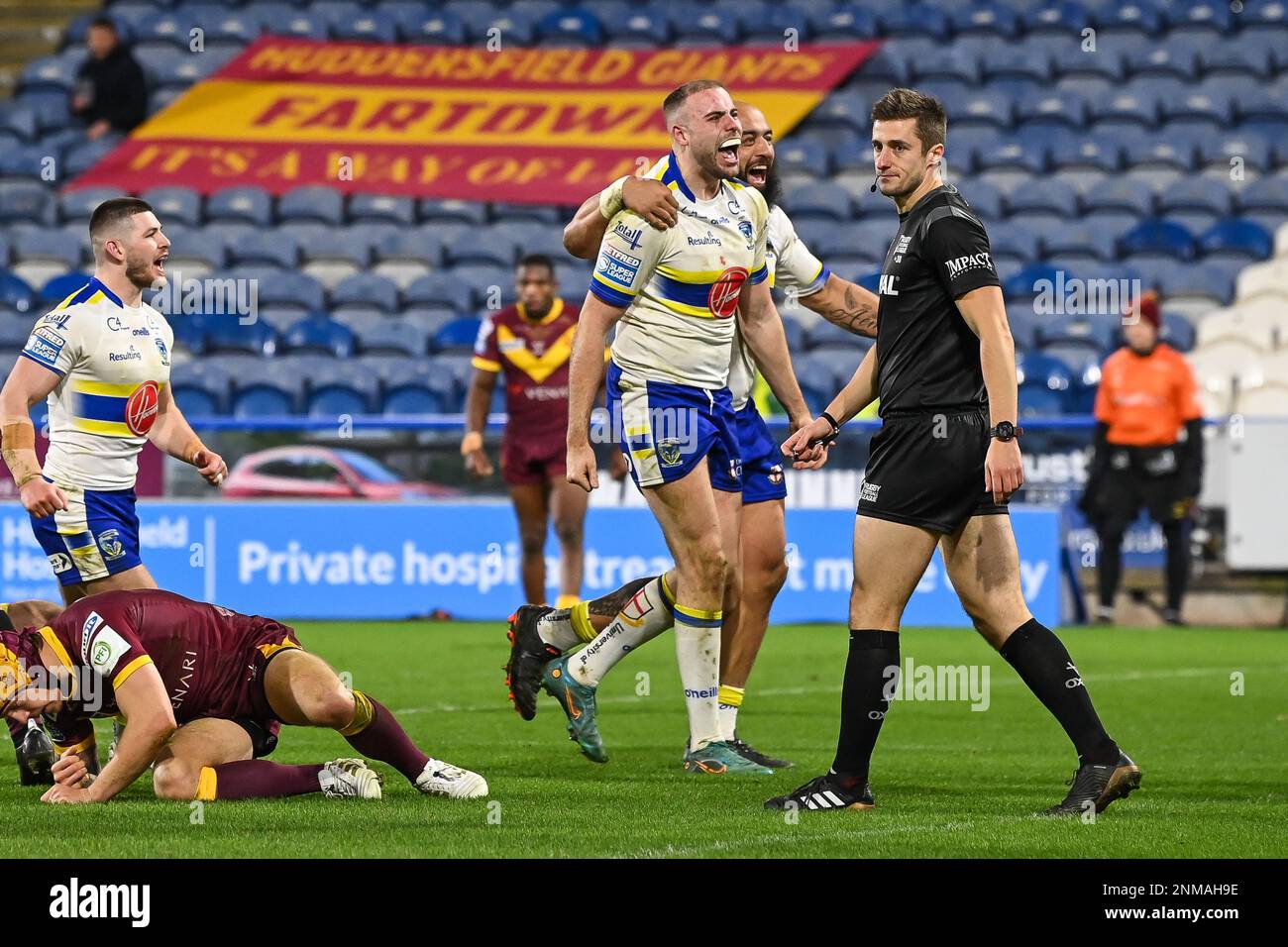 James Harrison #8 of Warrington Wolves celebrates his try during the ...