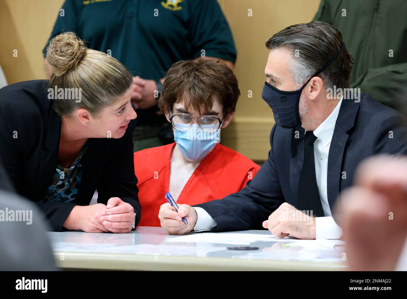 Assistant Public Defender Nawal Bashimam left, consults with Capital ...