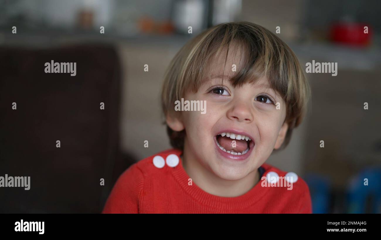Portrait of a happy child boy closeup face. Authentic real life laugh ...