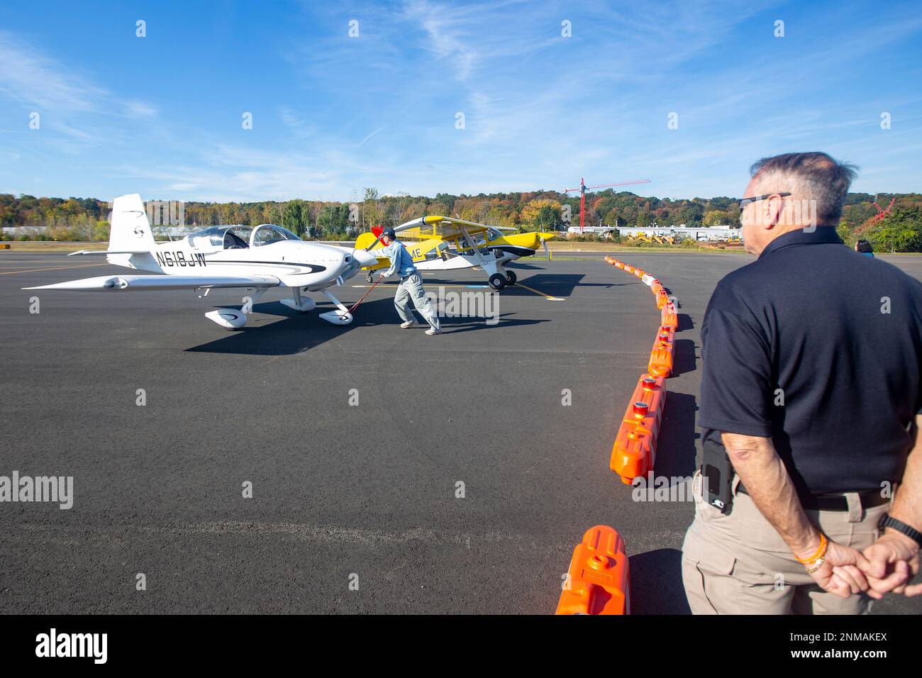 Pilot Mark Scott gets a plane ready for takeoff on the newly ...