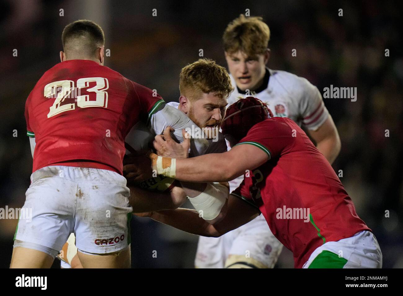 Rob Carmichael of England U20's runs at the Wales U20's defence during ...