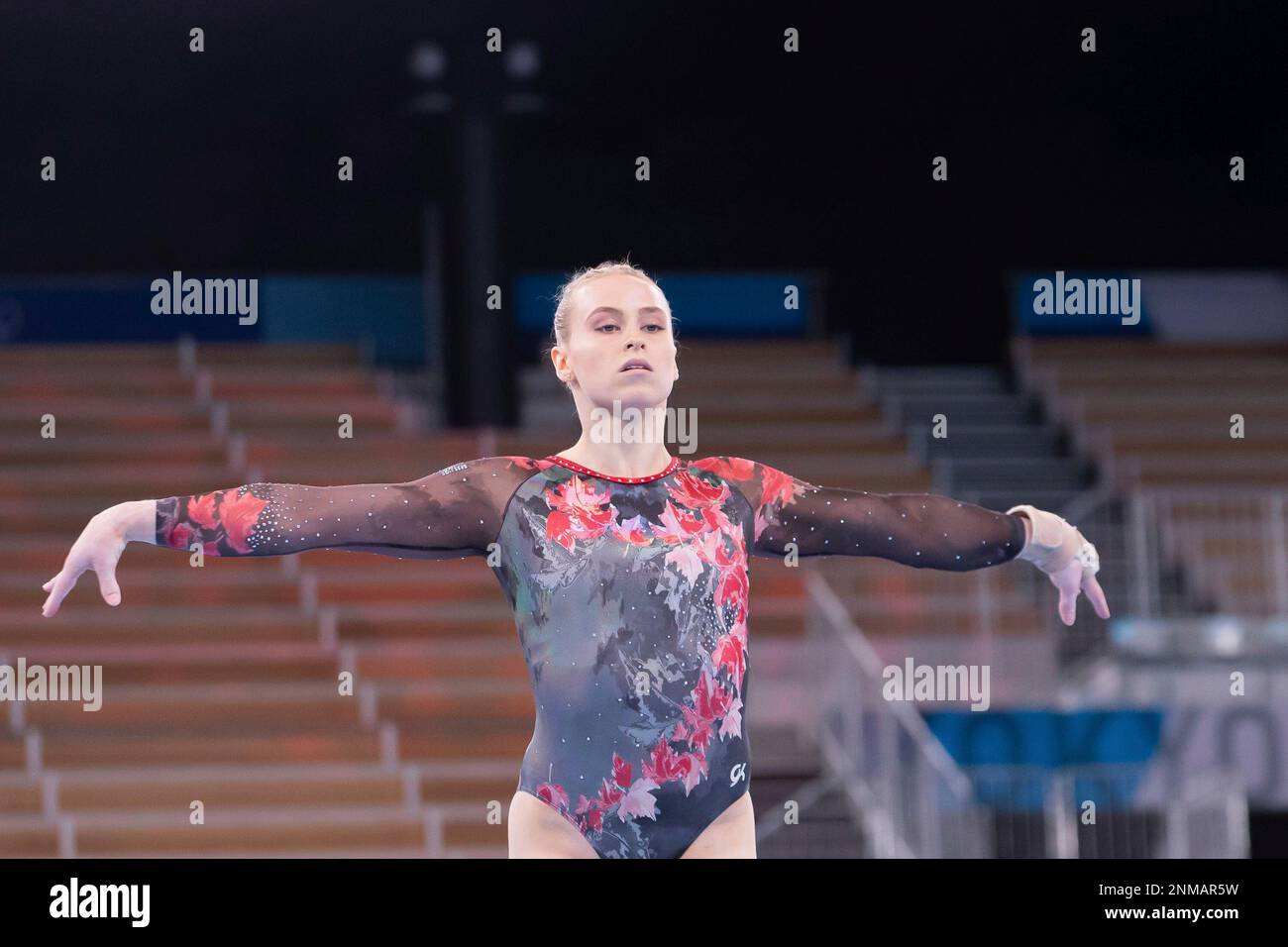July 25, 2021: Elsabeth Black (313) of Canada performs on balance beam ...