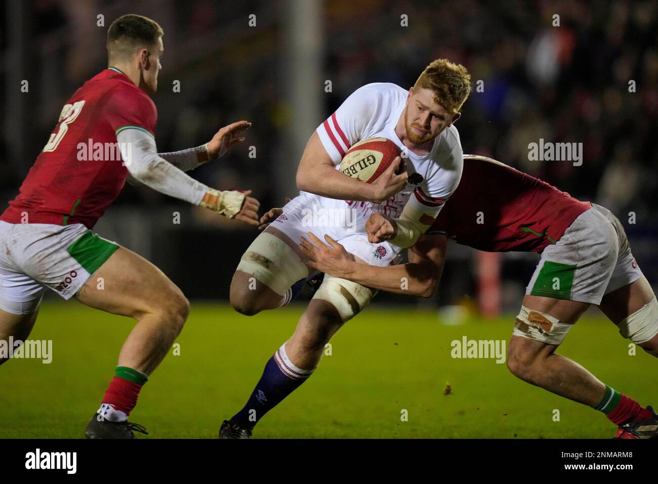 Colwyn Bay, UK. 24th Feb, 2023. Rob Carmichael of England U20's runs at ...