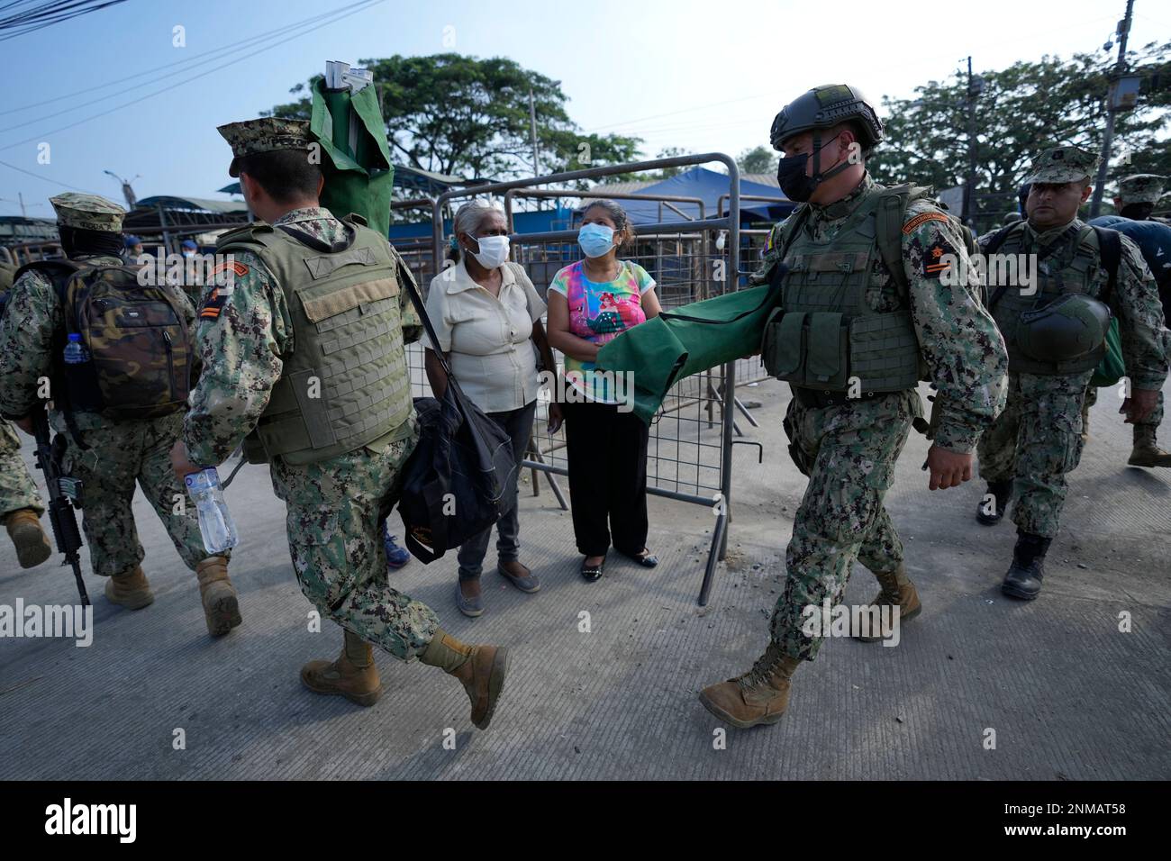 Soldiers walk out of the Litoral penitentiary, after deadly riots broke ...