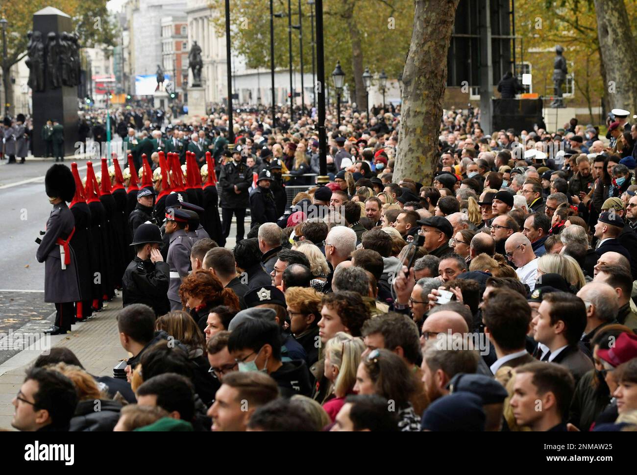 Crowds gather ahead of the Remembrance Sunday service at the Cenotaph ...