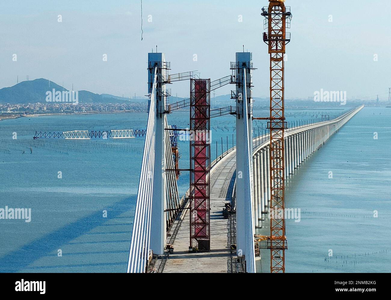 A view of the 14.7km-long Meizhou Bay Bridge under construction in ...