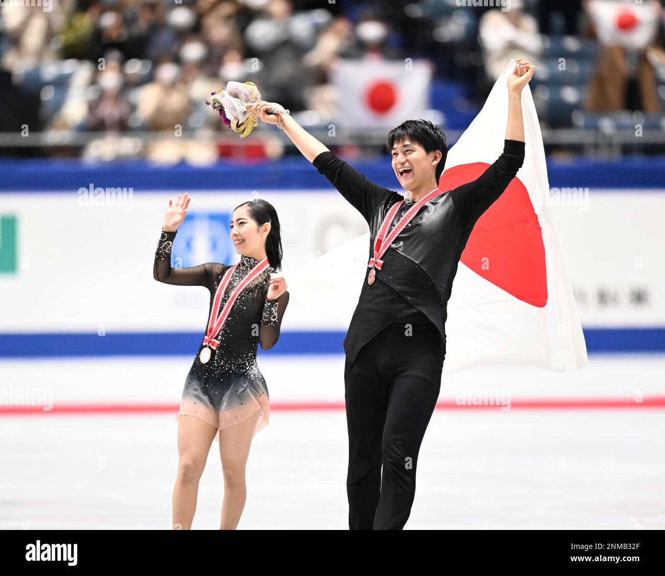 Japanese Riku Miura and Ryuichi Kihara perform during the Pairs Free at Yoyogi National Stadium ...