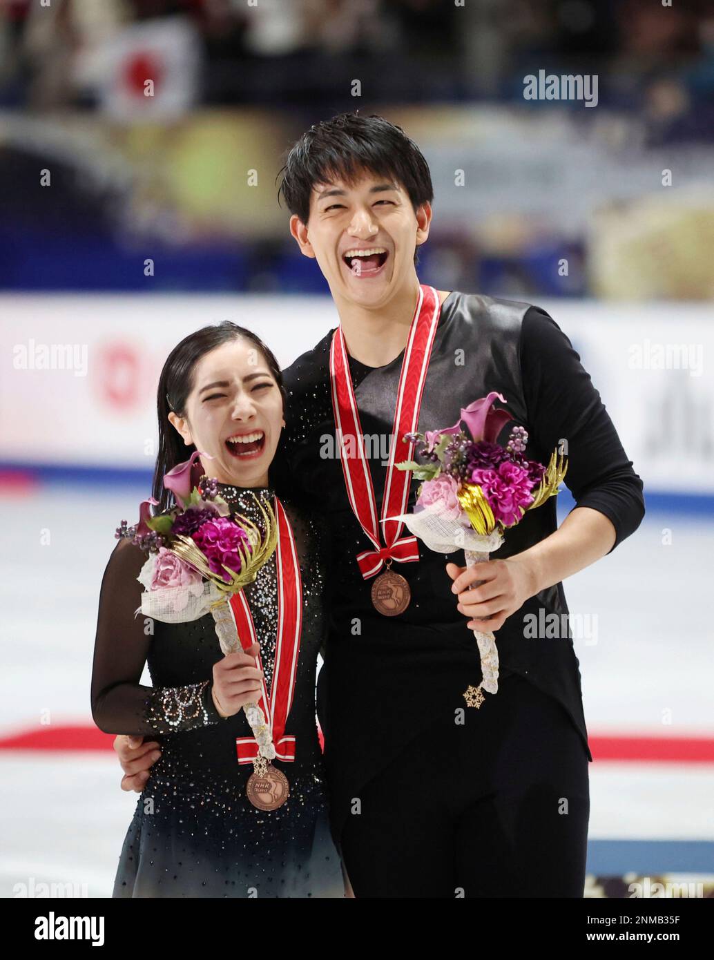 Japanese Riku Miura and Ryuichi Kihara perform during the Pairs Free at Yoyogi National Stadium ...