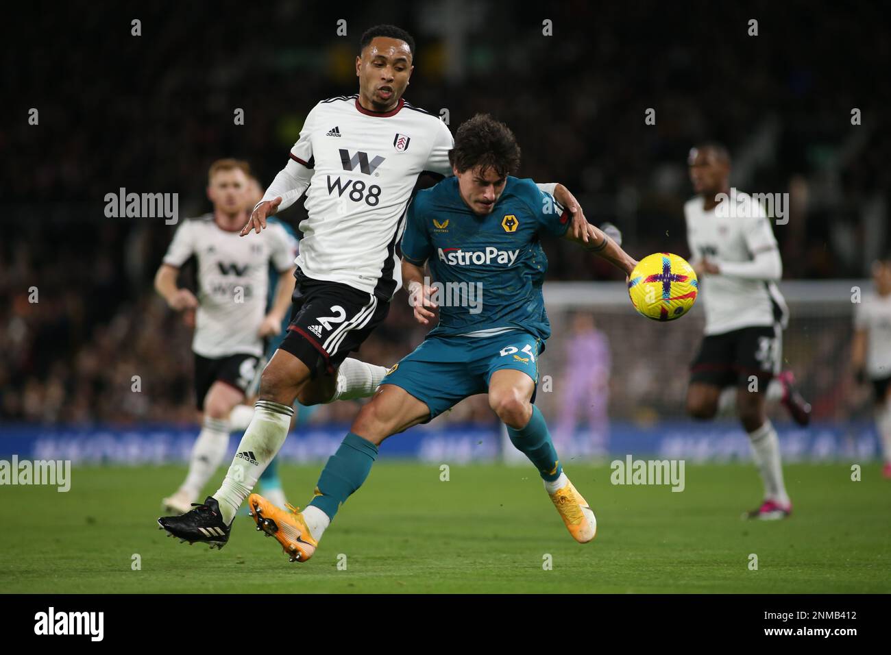 London, UK. 18th Feb, 2023. Bobby Reid of Fulham and Hugo Bueno of ...
