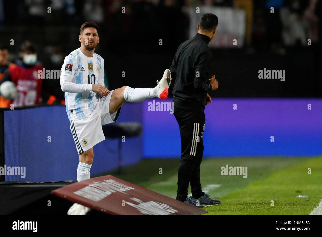 Argentina's Lionel Messi warms on the sidelines during a qualifying ...