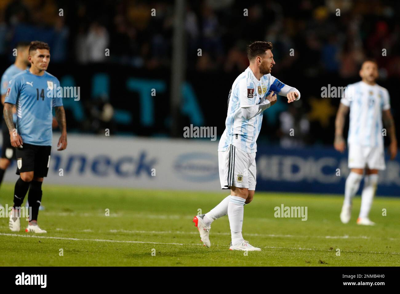 Argentina's Lionel Messi puts on the captain's band during a qualifying ...