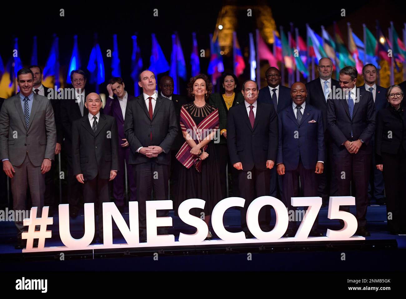 UNESCO Director General Audrey Azoulay, center, and world leaders pose ...