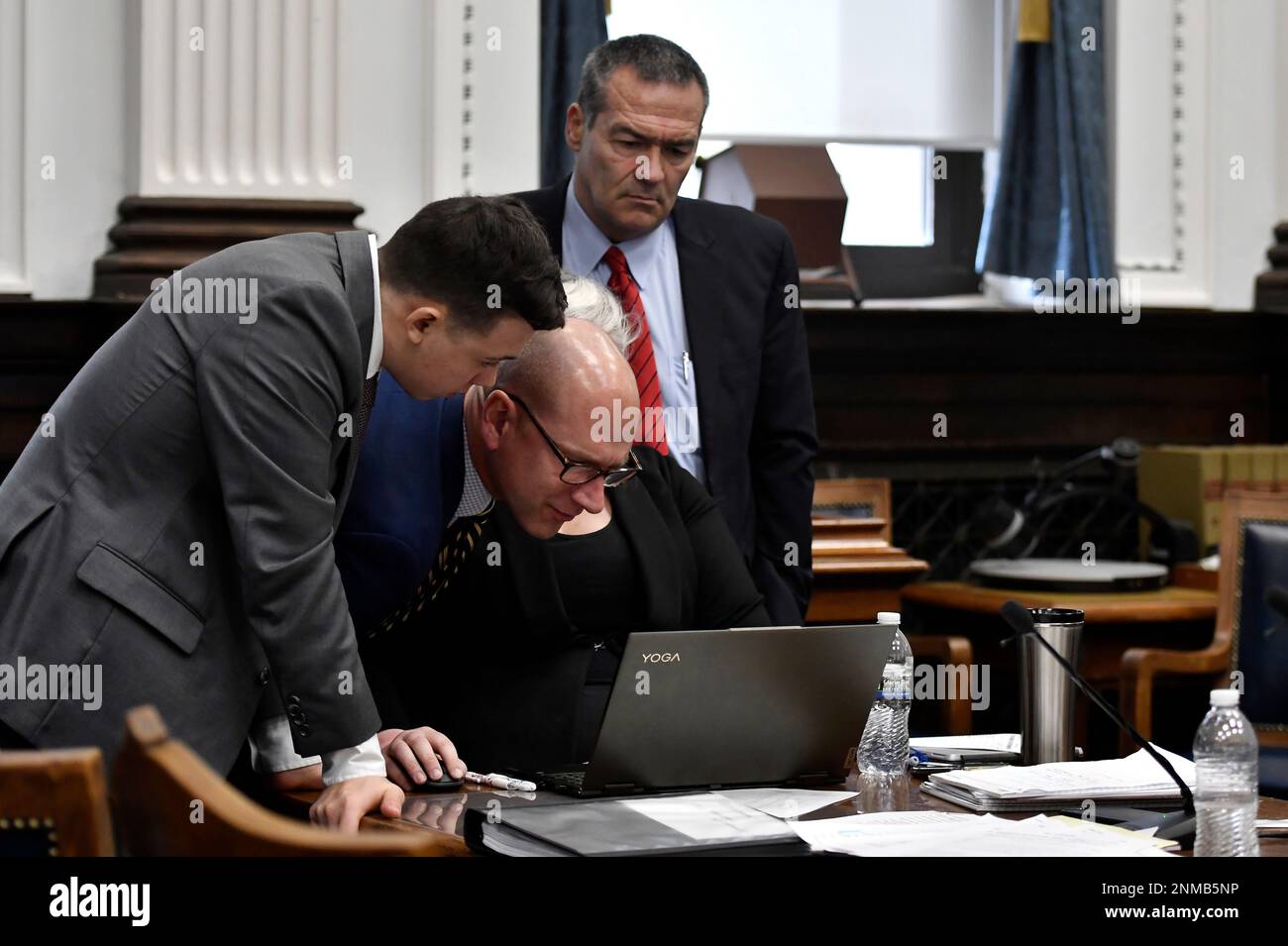 Kyle Rittenhouse, left, and his attorneys look at video during ...